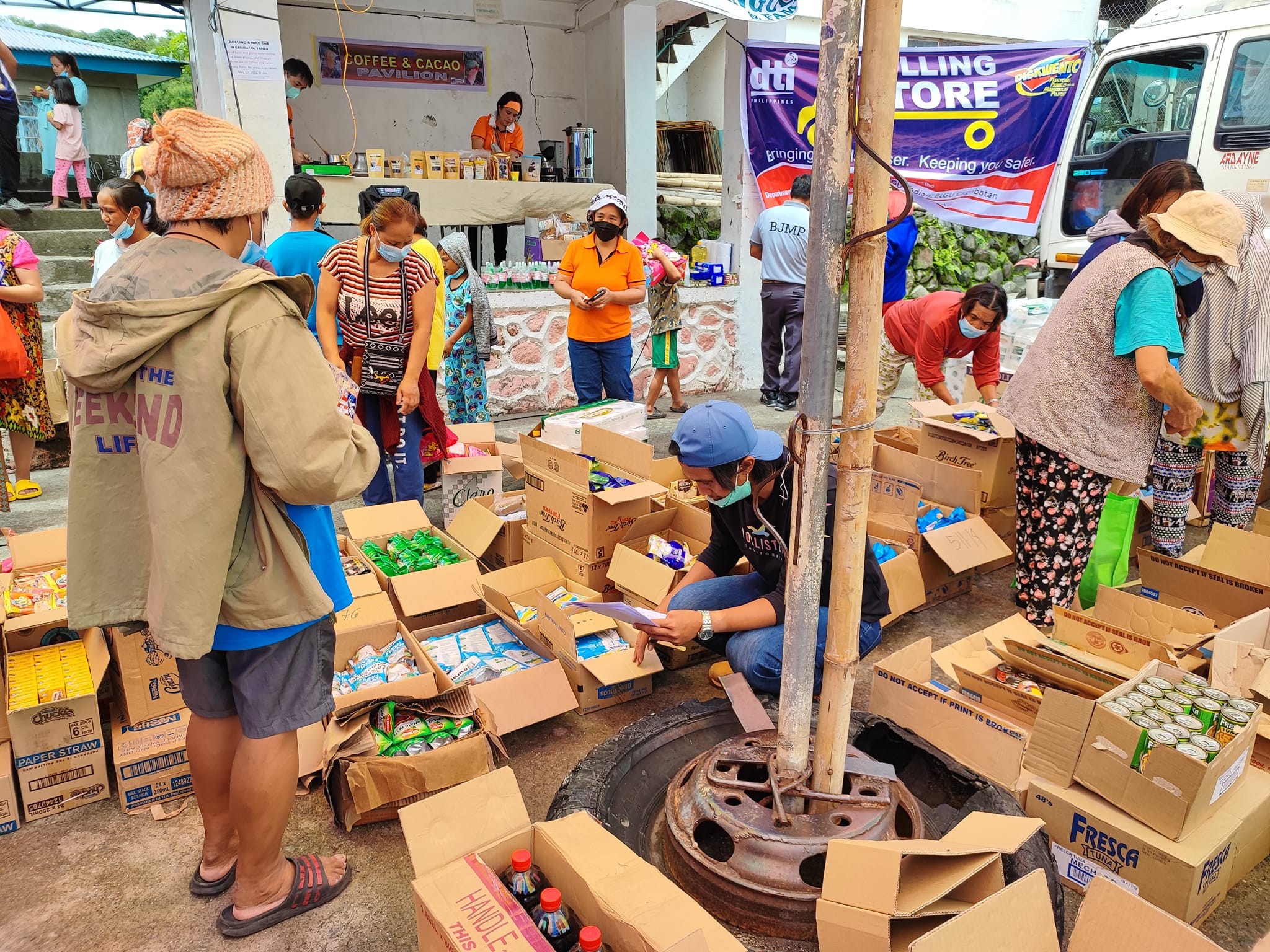 PIA - DTI brings rolling store to Tadian barangay PIA - DTI brings rolling store to Tadian barangay